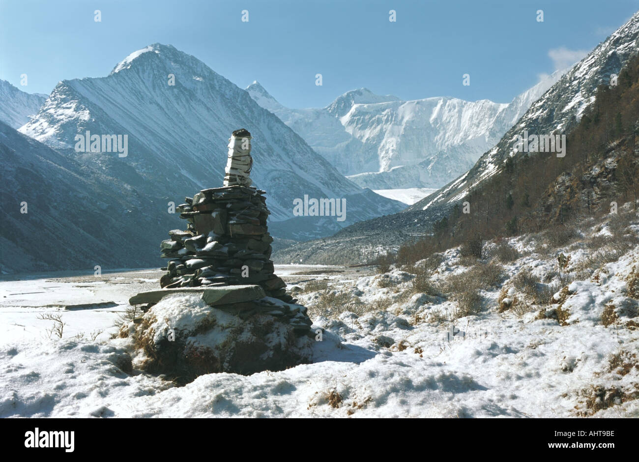 Stone construction with tied up cloth ribbons symbolizes geographical ...