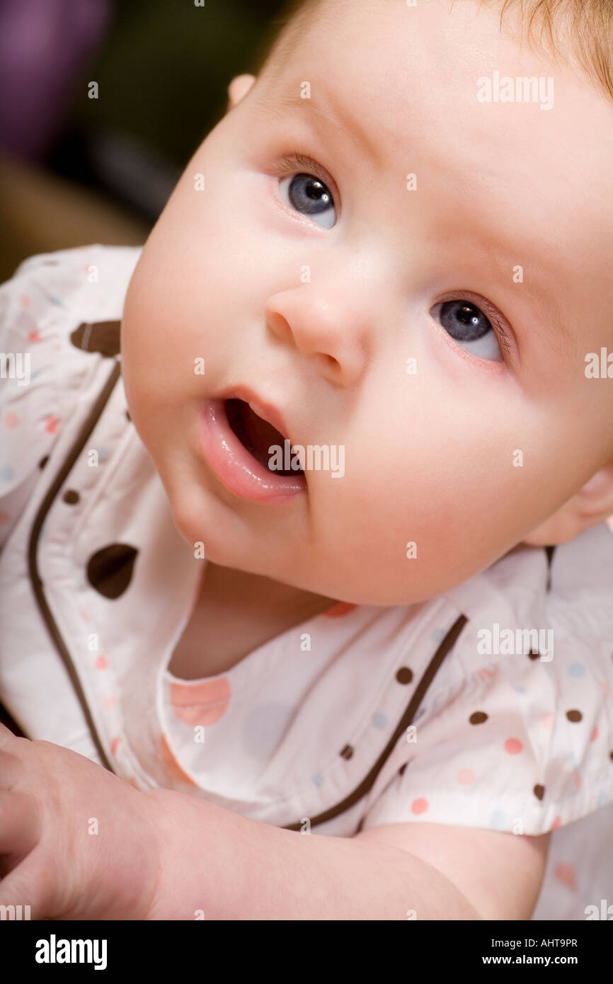 Baby looking up Stock Photo - Alamy