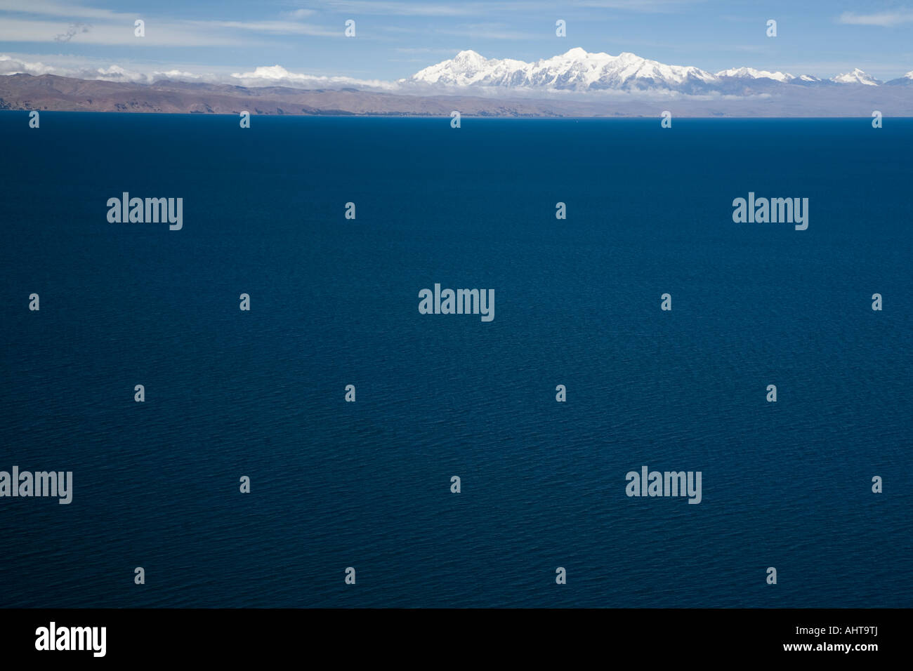 View over the lake to Cordillera Real and Mount Illampu, across Lake ...