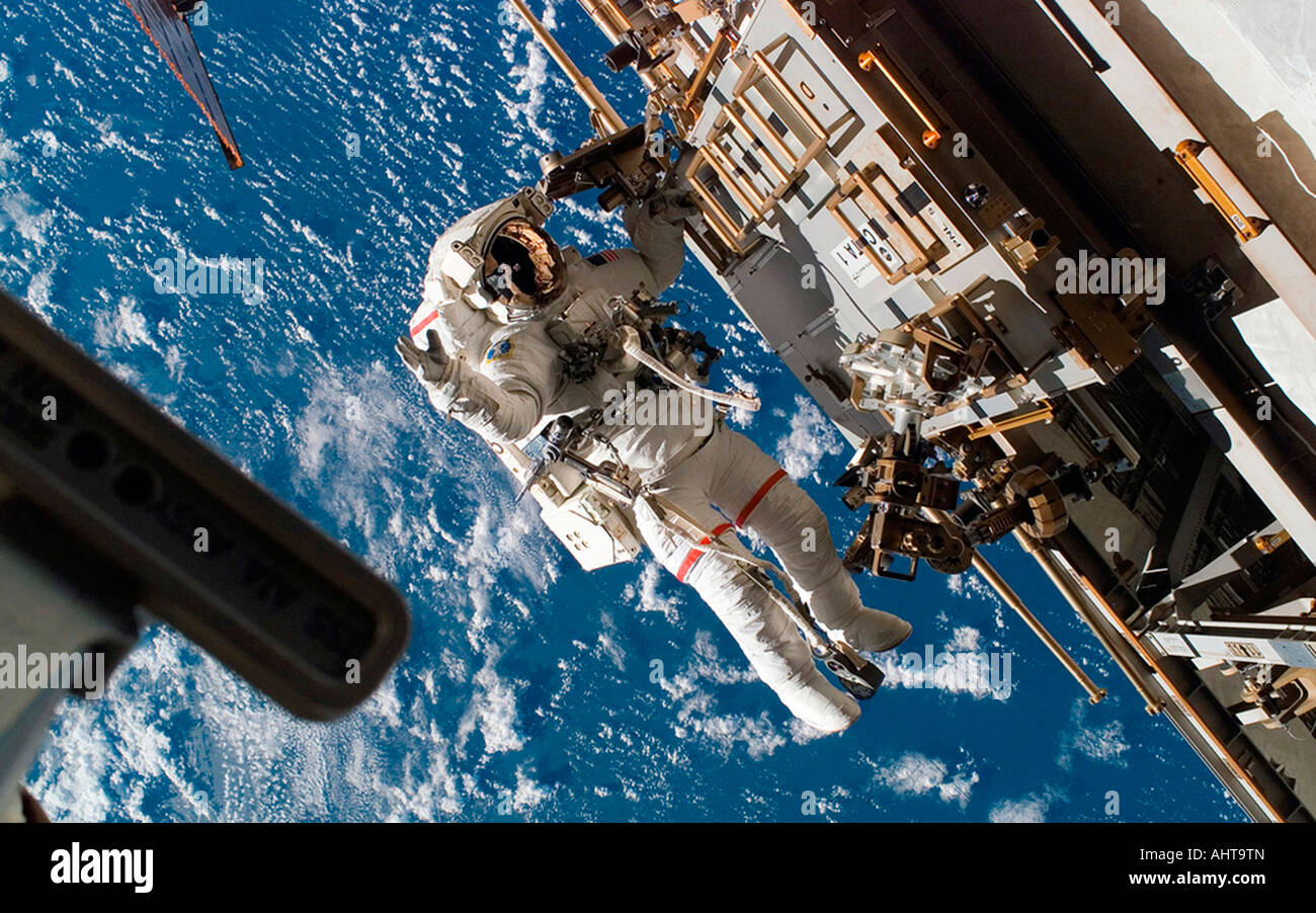 astronaut making spacecraft repairs Stock Photo - Alamy