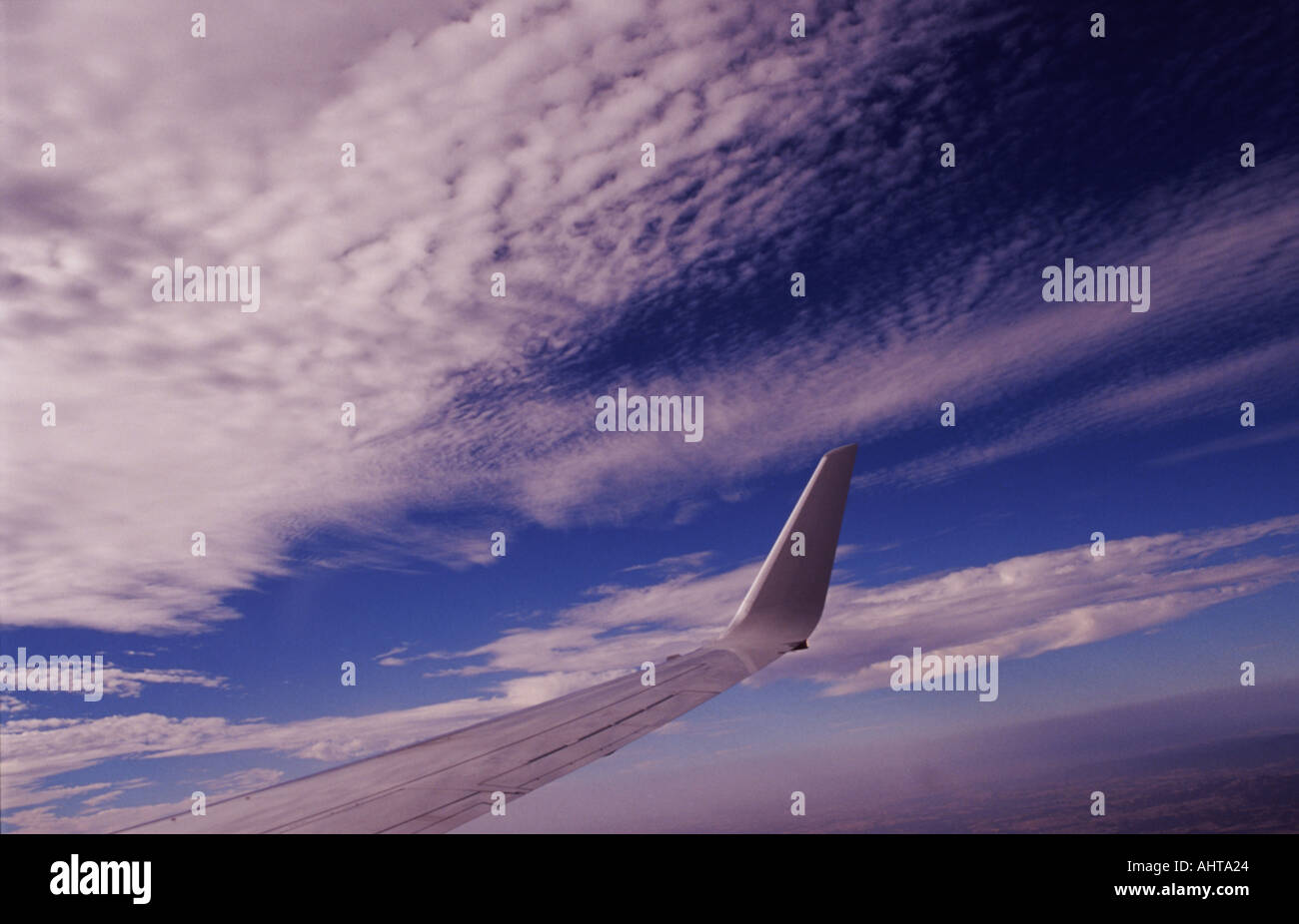 View of plane wing during flight Stock Photo - Alamy