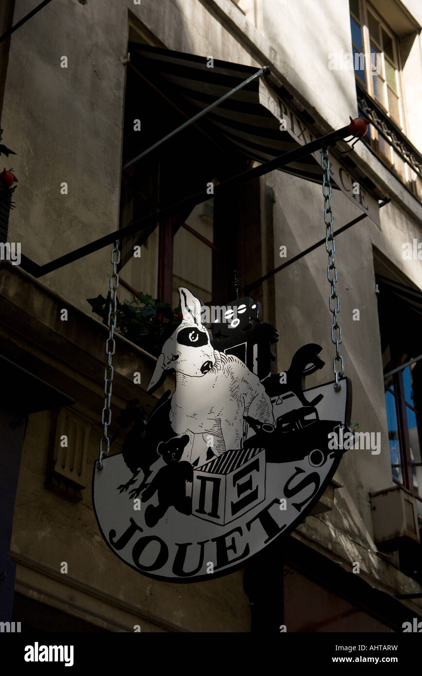 Shop sign in Paris Stock Photo - Alamy