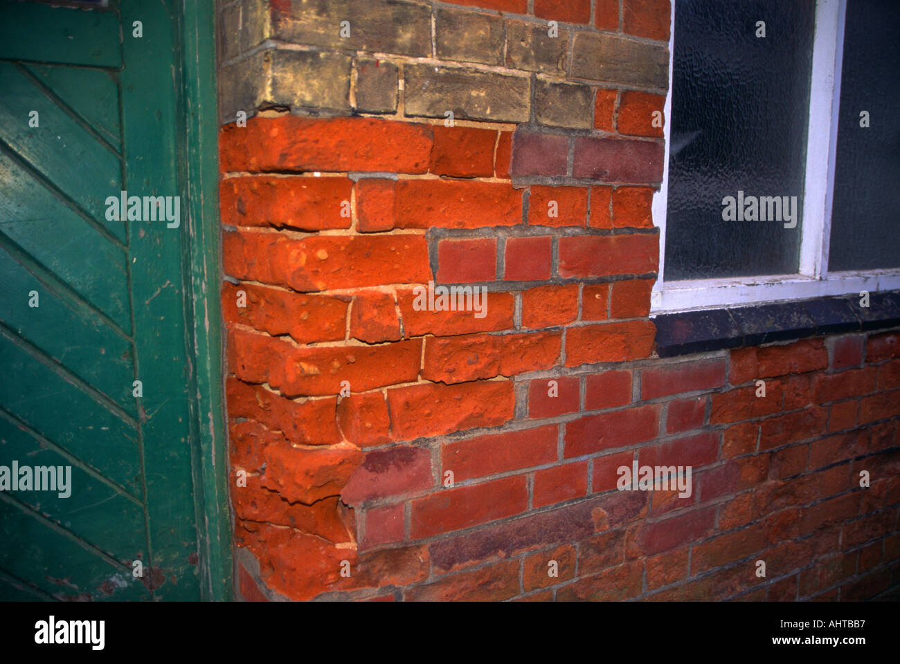 Weathering of red brick wall Stock Photo - Alamy