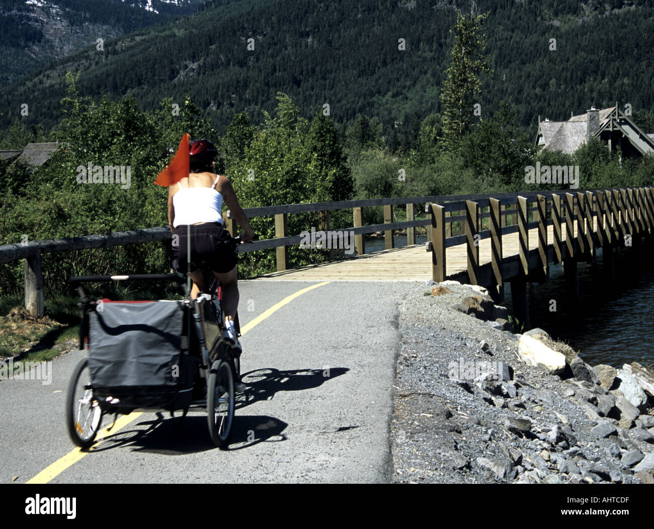 Pulling a child carriage hi-res stock photography and images - Alamy