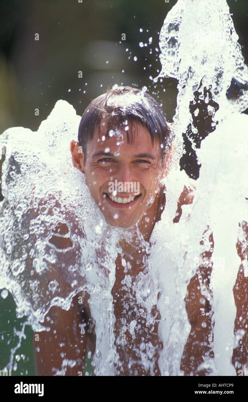 man taking shower Stock Photo - Alamy