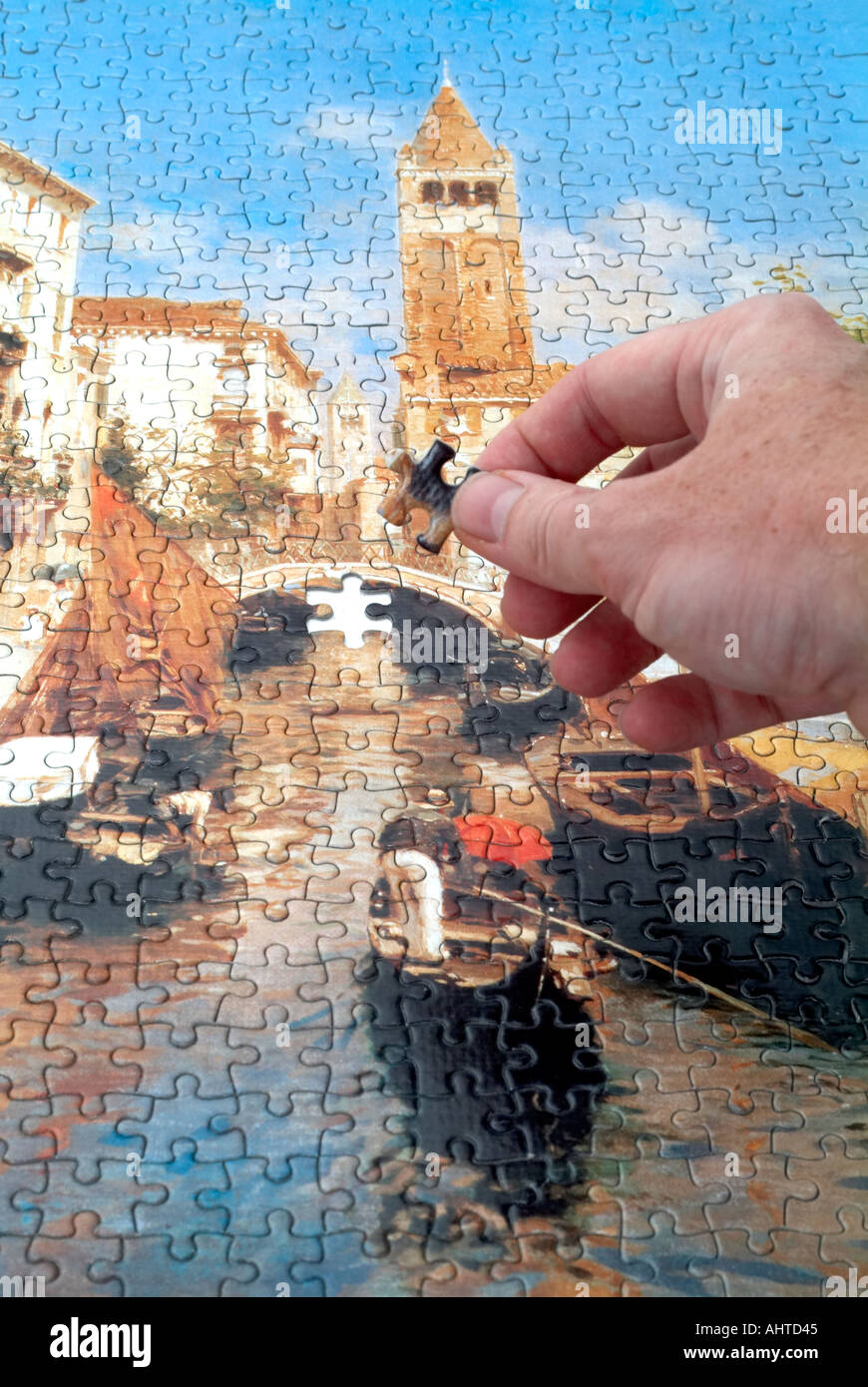 Finishing a puzzle hi-res stock photography and images - Alamy