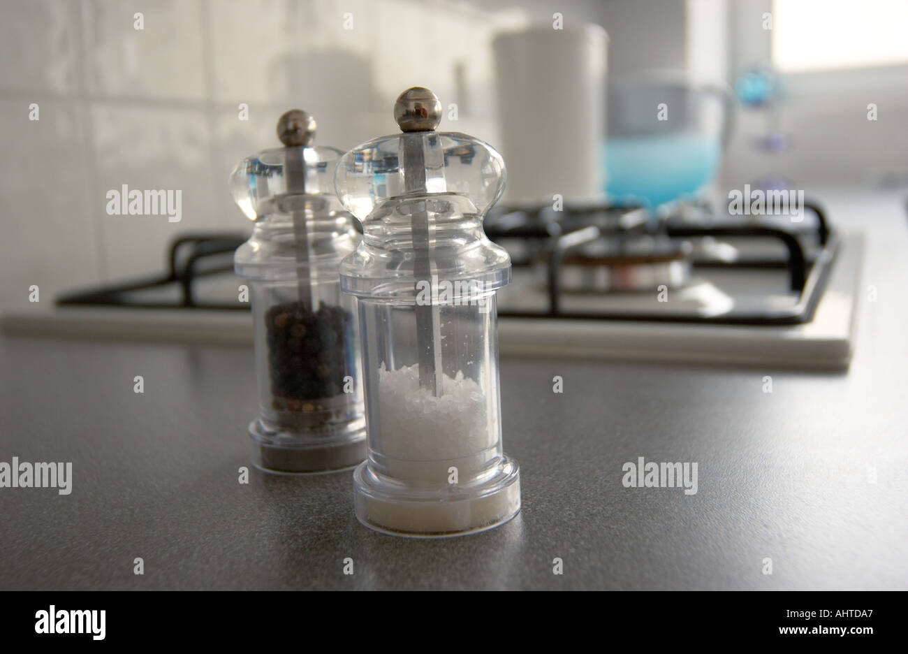 salt and pepper shakers in kitchen Stock Photo - Alamy