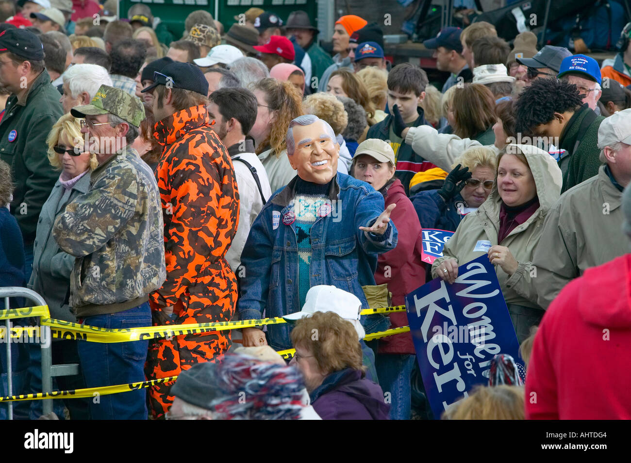 Kerry supporter dons a George W Bush mask during a Kerry Edwards mid ...