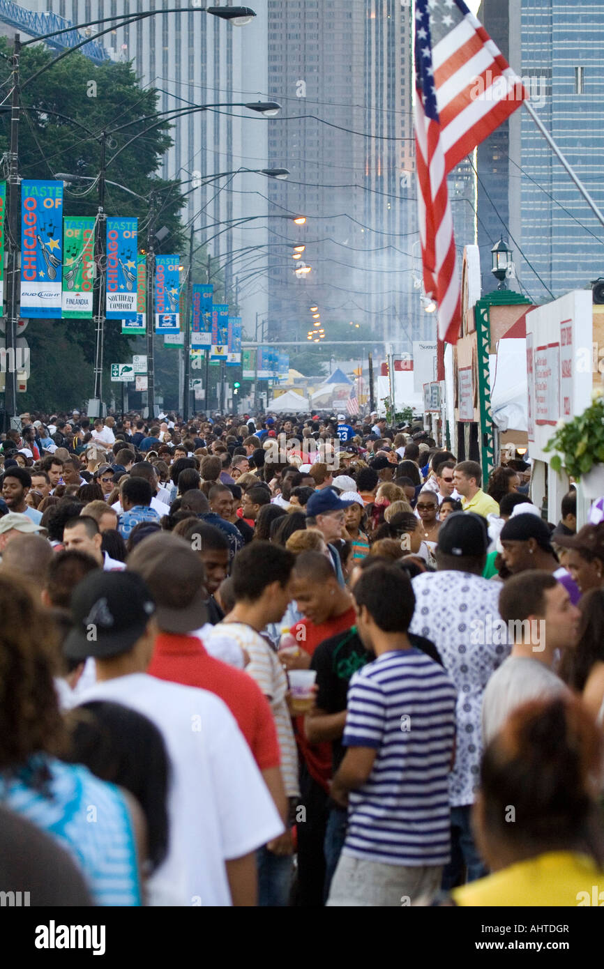 Large crowd of people walking at the Taste of Chicago outdoor festival ...