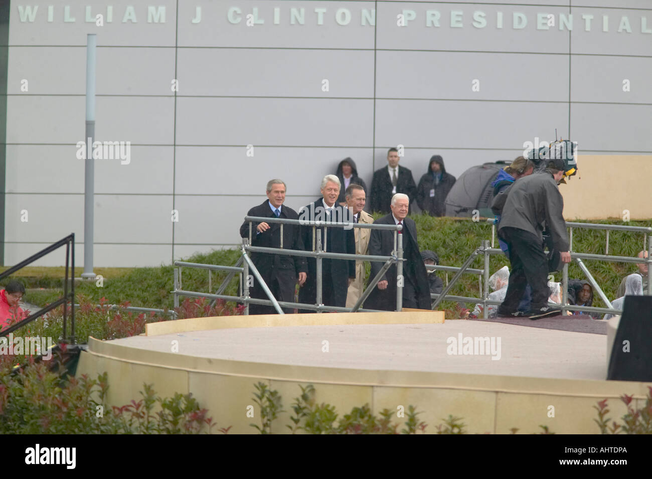 Former U S President Bill Clinton approaches the stage with President ...