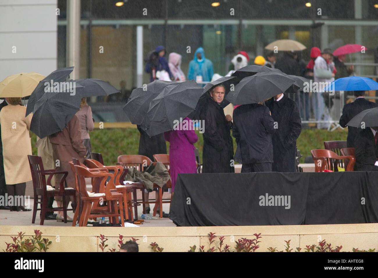 President George W Bush and others on stage during the grand opening ...