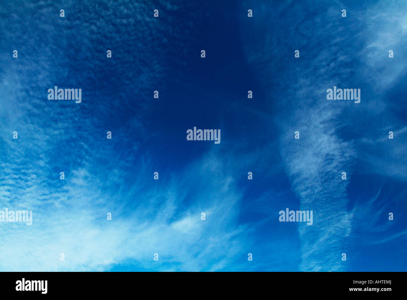 Cloud patterns on blue sky Stock Photo - Alamy