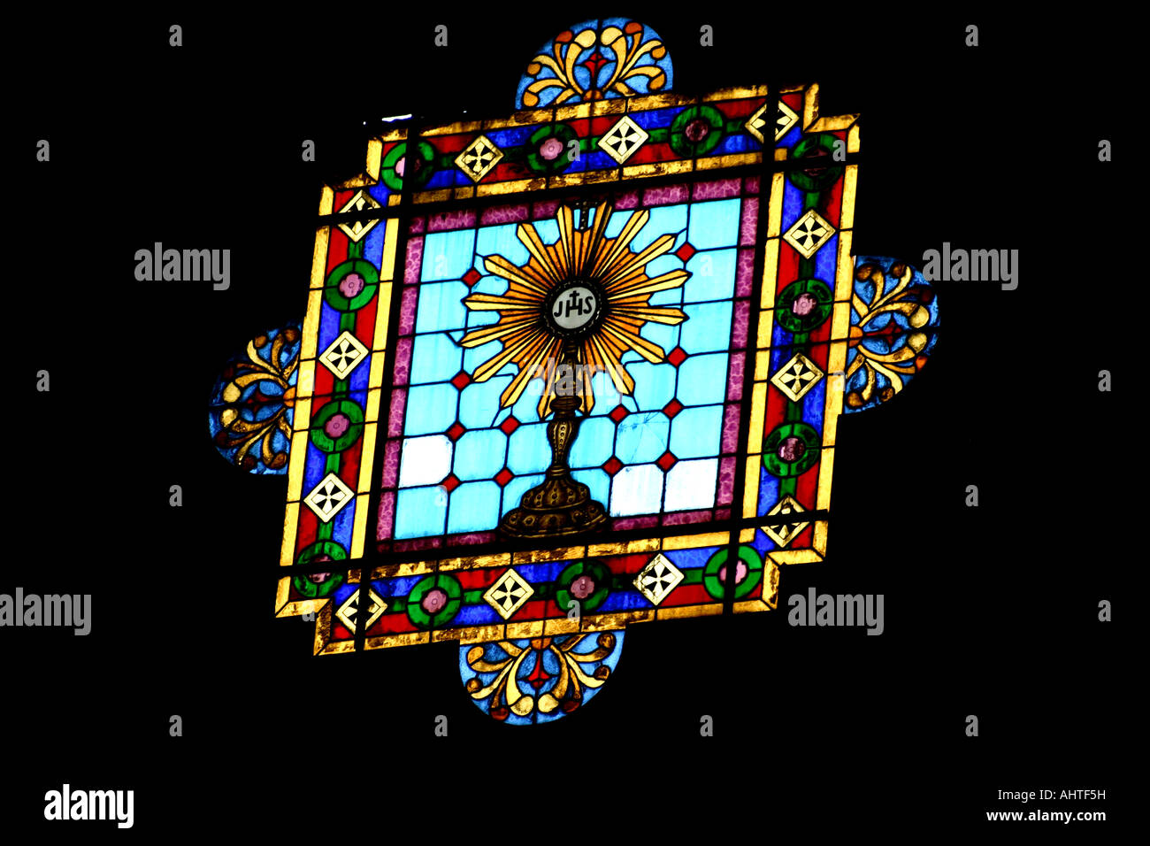 Church vitral made of colorful glass depicting the comunion of Christ ...