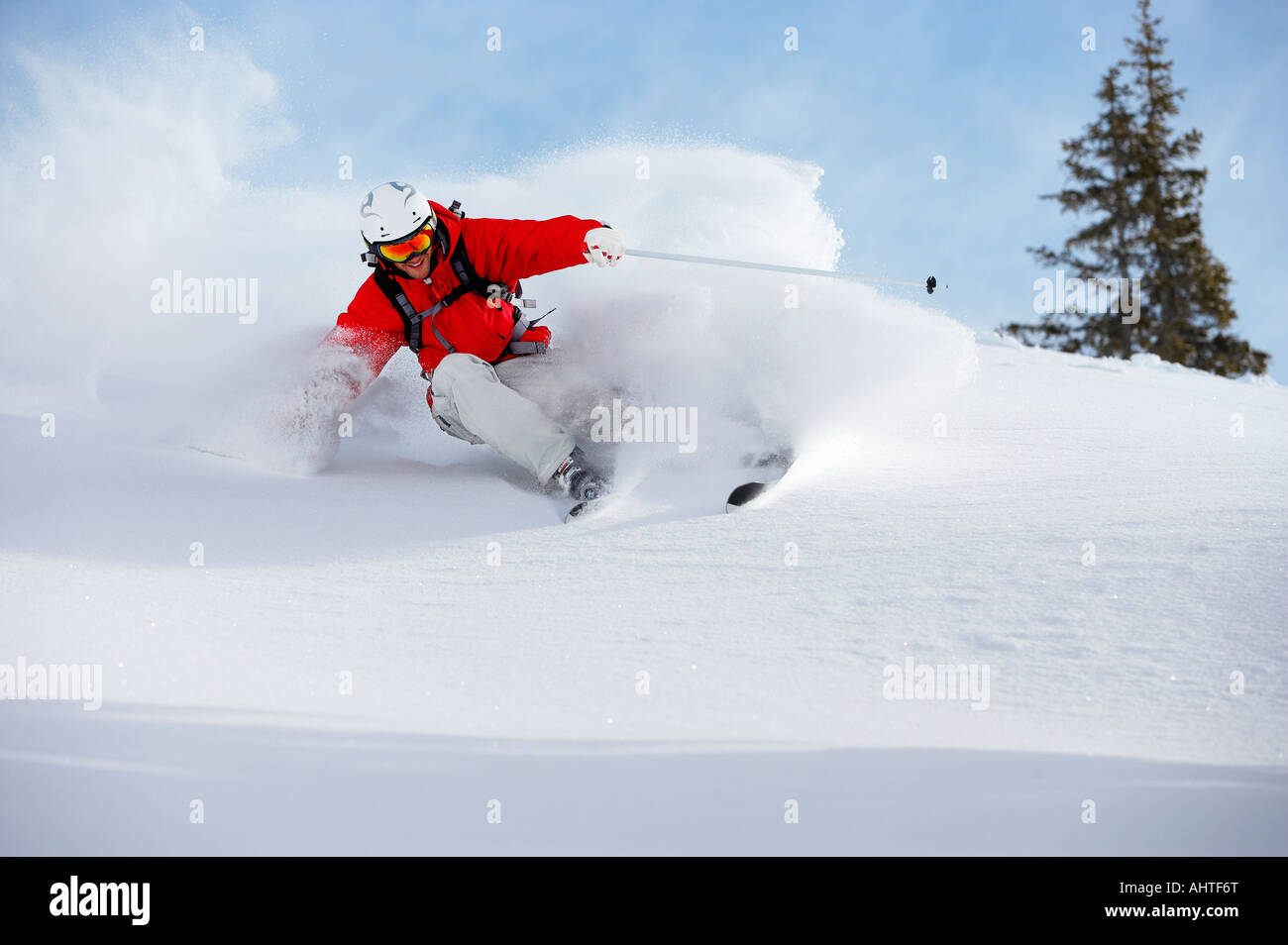 Skier turning on powder snow hi-res stock photography and images - Alamy