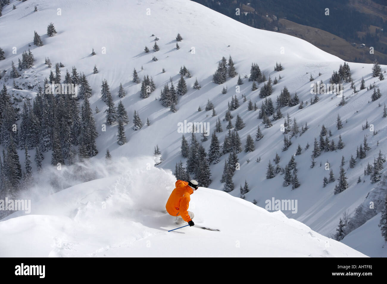 Man skiing down snow mountain slope, overhead view Stock Photo - Alamy
