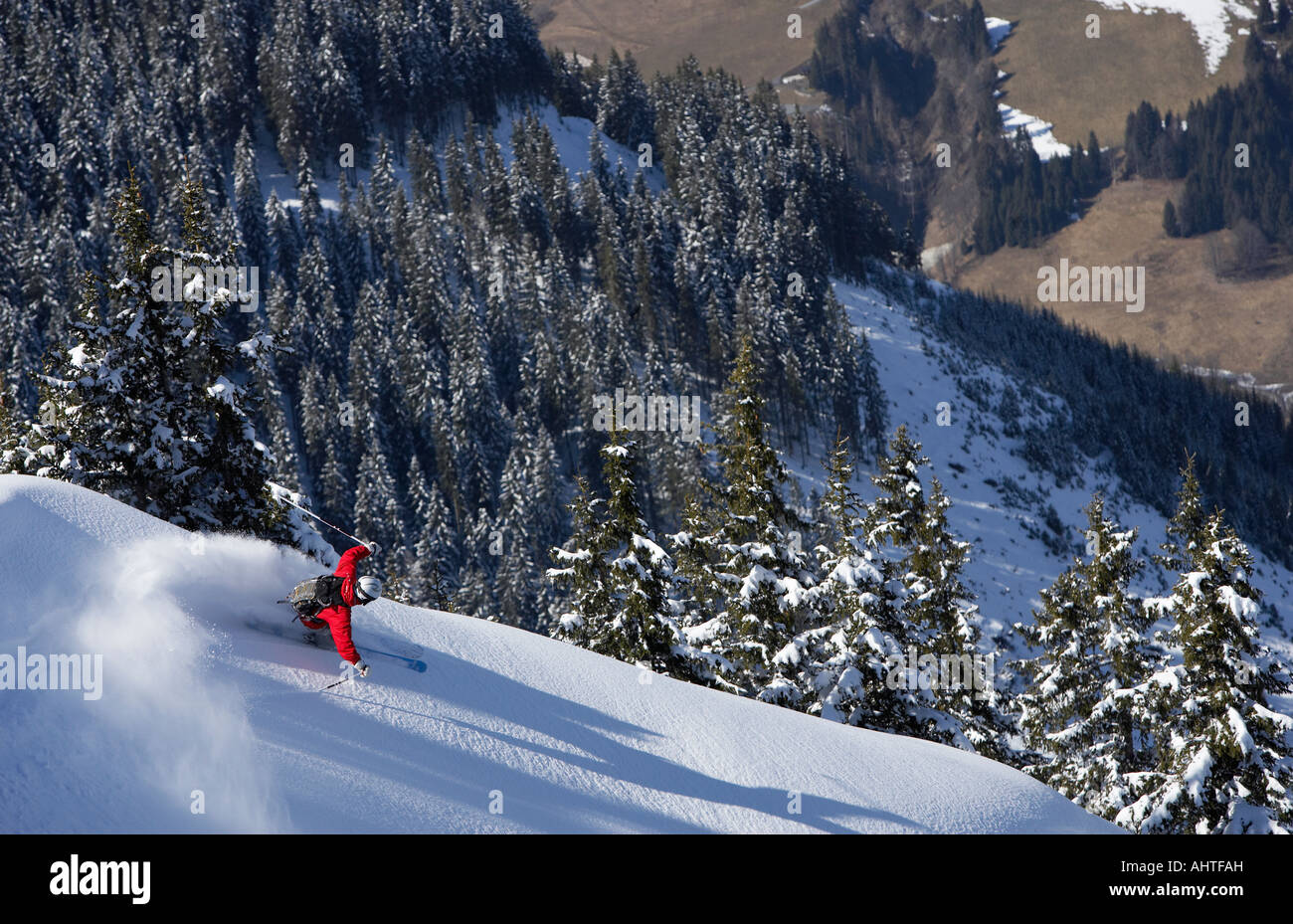 Man skiing down snow mountain slope, overhead view Stock Photo - Alamy