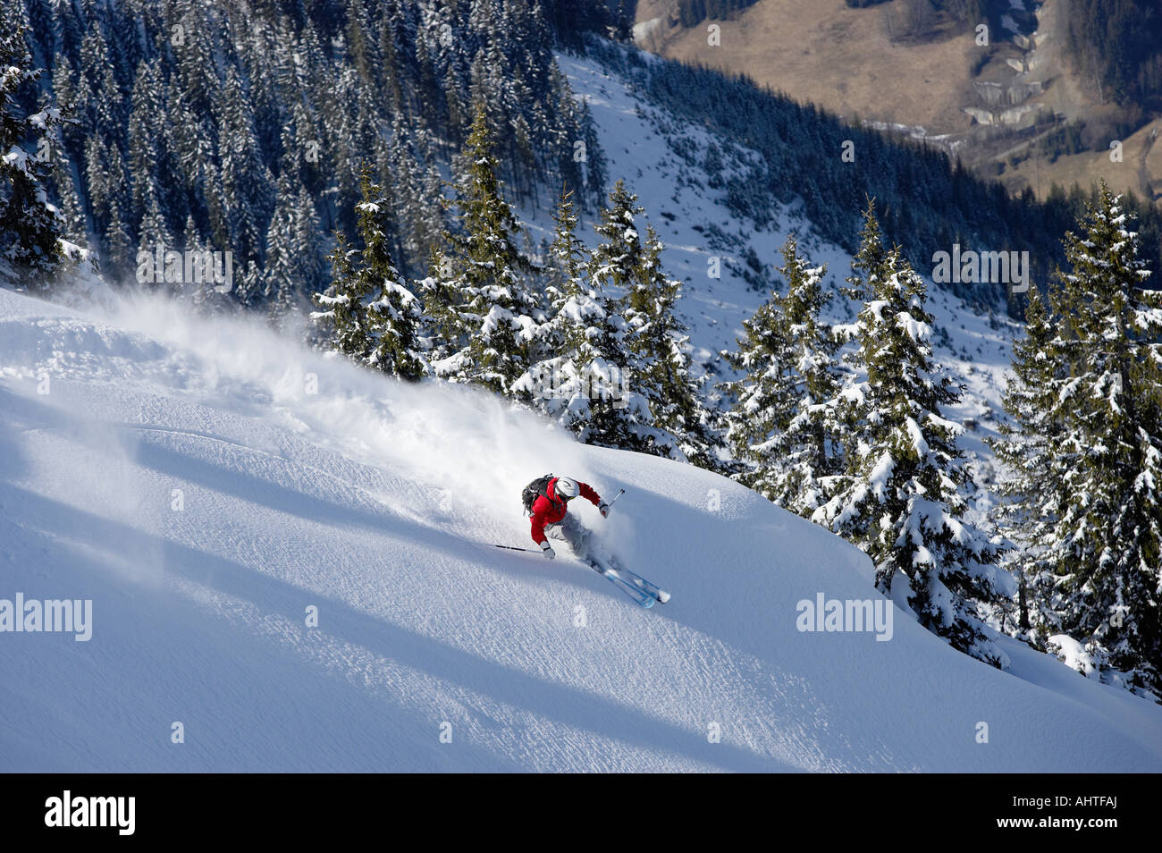 Man skiing down snow mountain slope, overhead view Stock Photo - Alamy