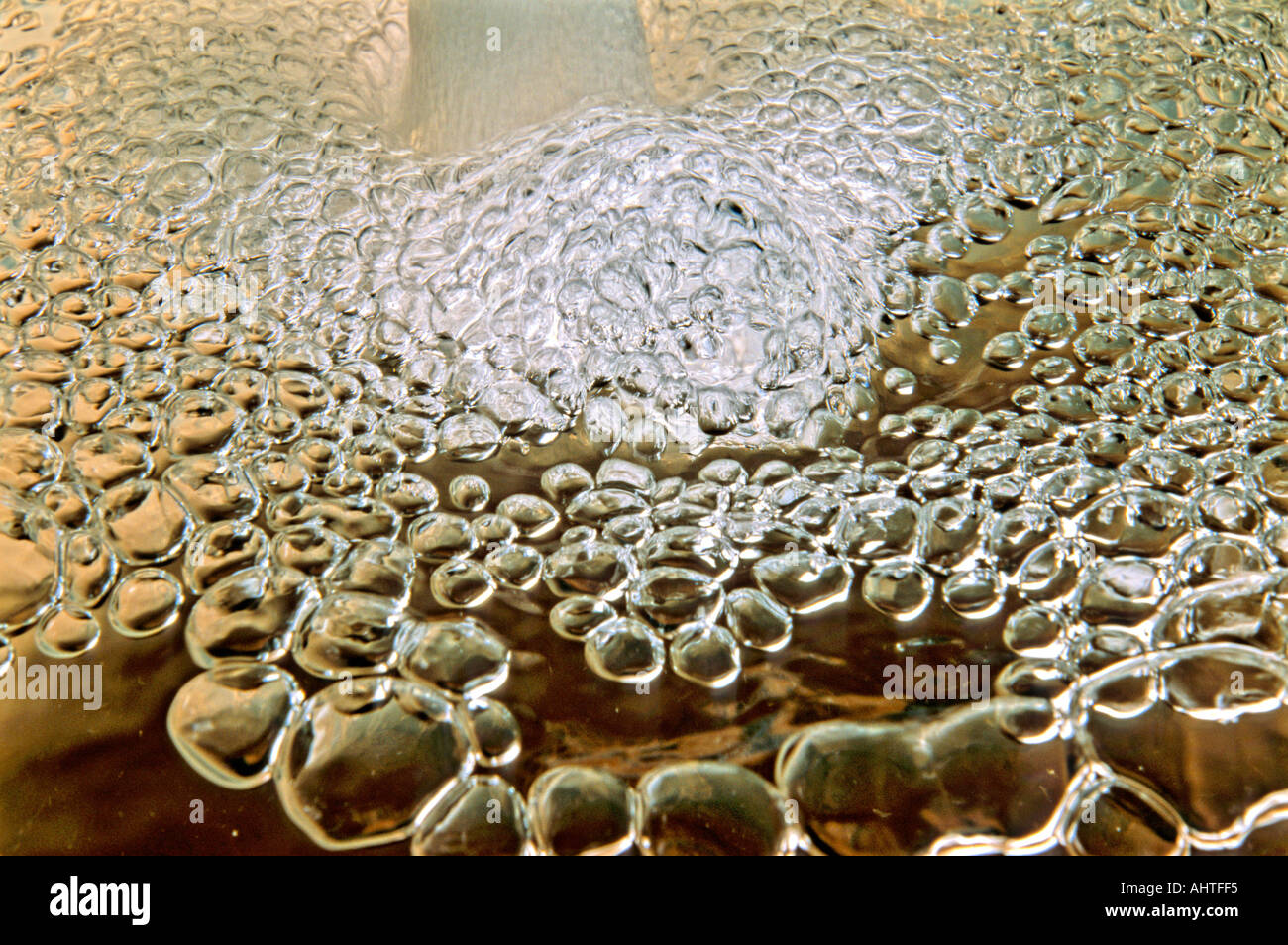 Water running with bubbles 2 Stock Photo - Alamy