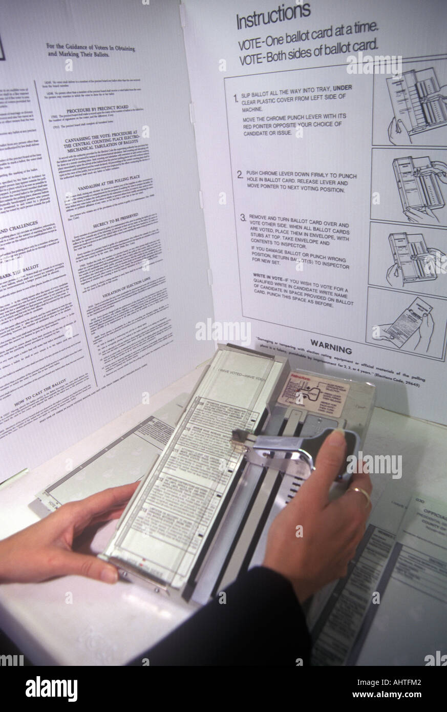 Close up of a voting booth and ballot machine with ballot CA Stock ...