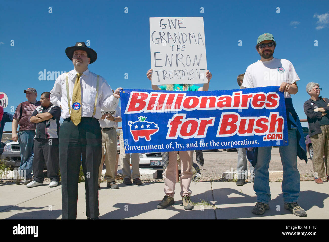 Protestor in Tucson Arizona of President George W Bush holding a sign ...