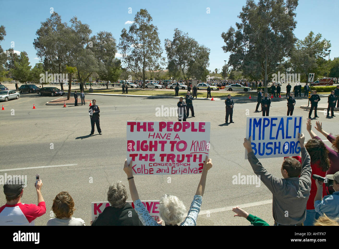 Presidential Motorcade with President George W Bush past anti Bush ...