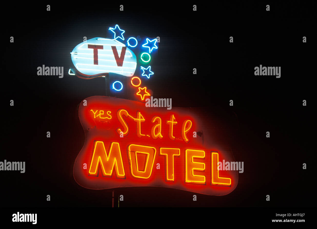A neon sign that reads State Motel Stock Photo - Alamy