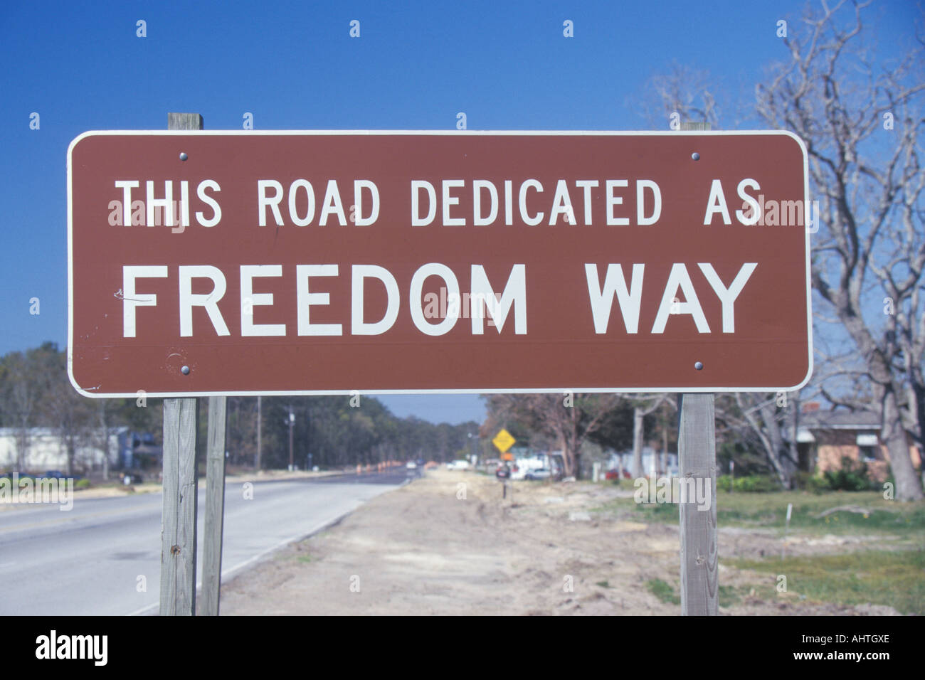 A sign that reads This road dedicated as Freedom Way Stock Photo - Alamy