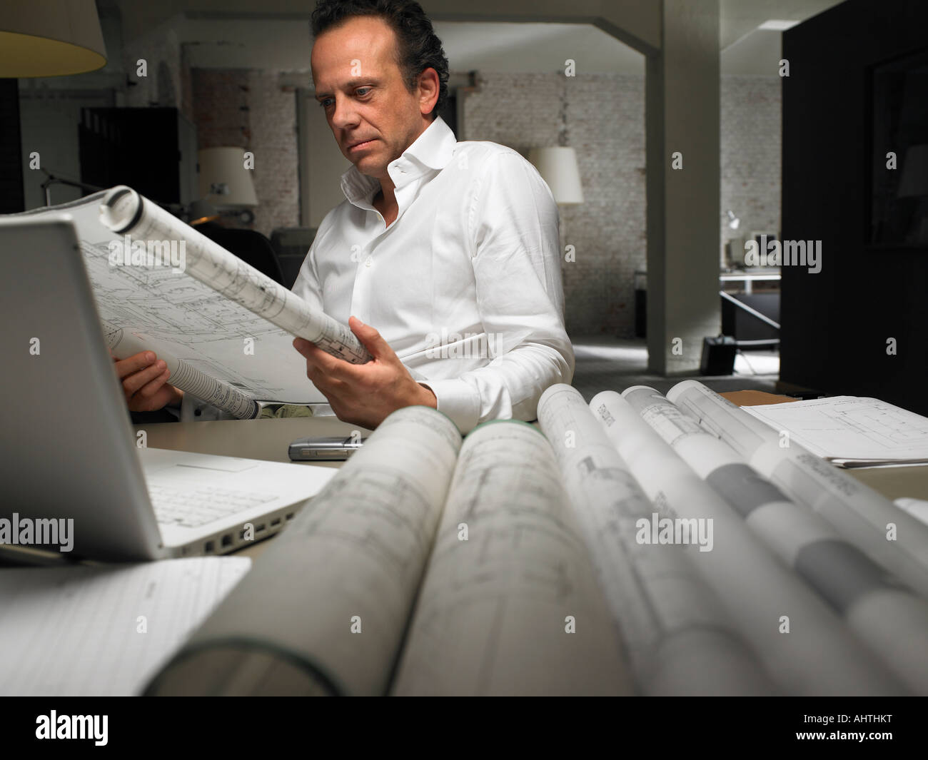 Architect reading a blueprint brussels hi-res stock photography and ...