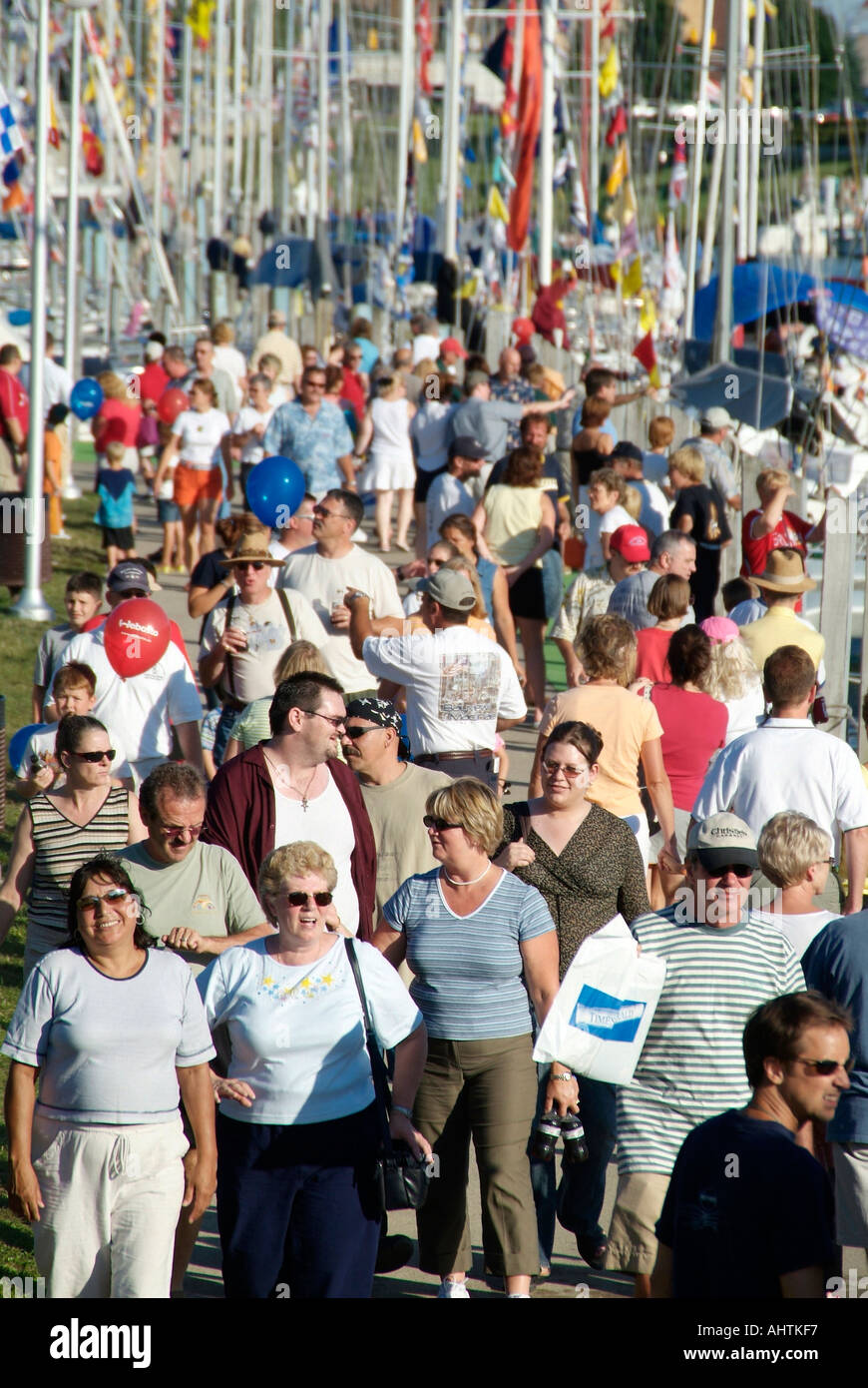 large crowd of people walk on boardwalk at Port Huron Michigan Stock ...