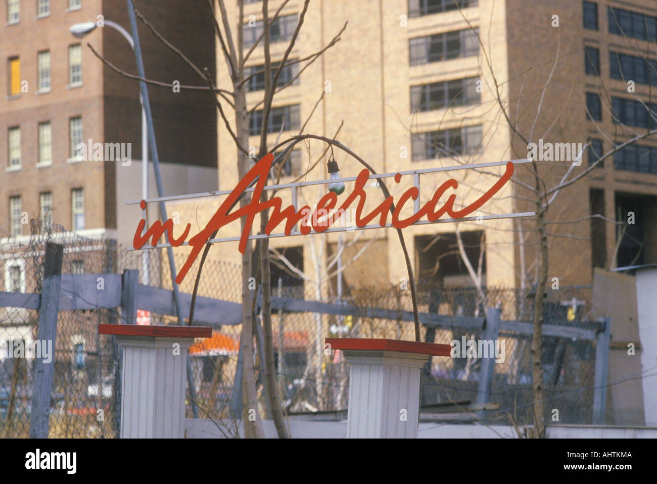 A sign that reads in America Stock Photo - Alamy