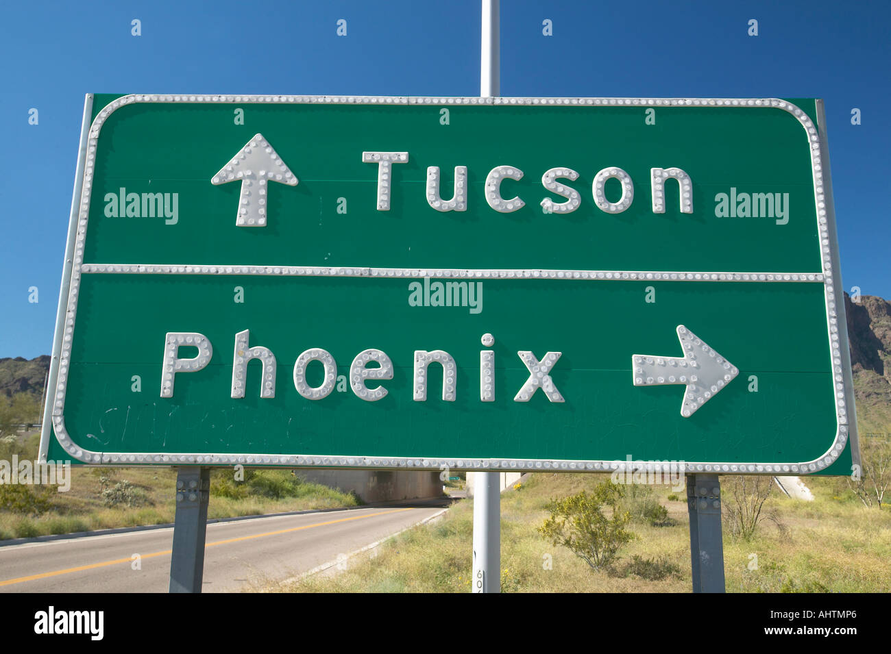 A interstate highway sign in Arizona directing traffic to Tucson and ...