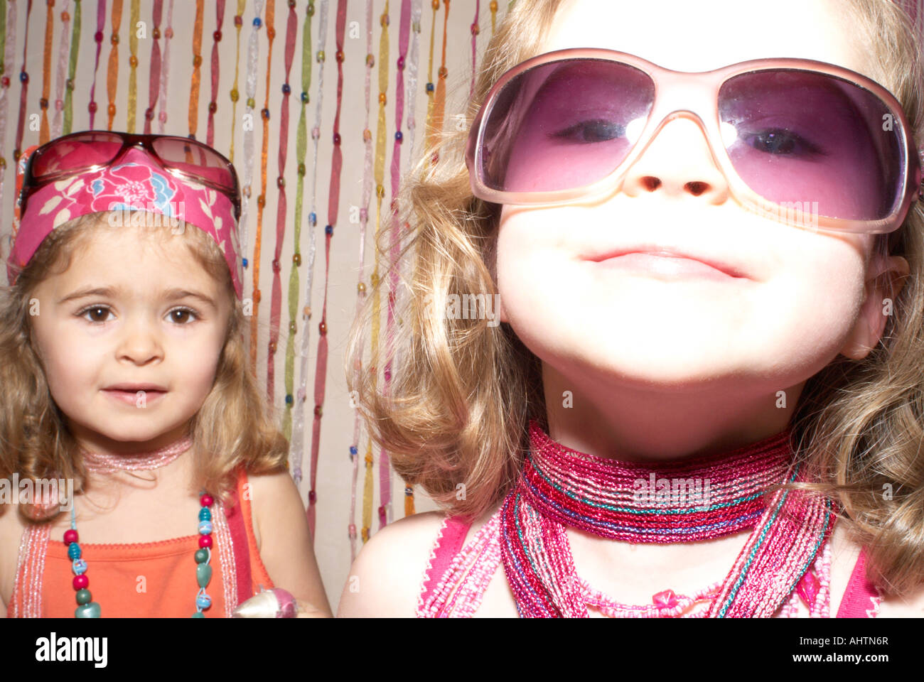 Two girls (2-4) dressed for a party Stock Photo - Alamy