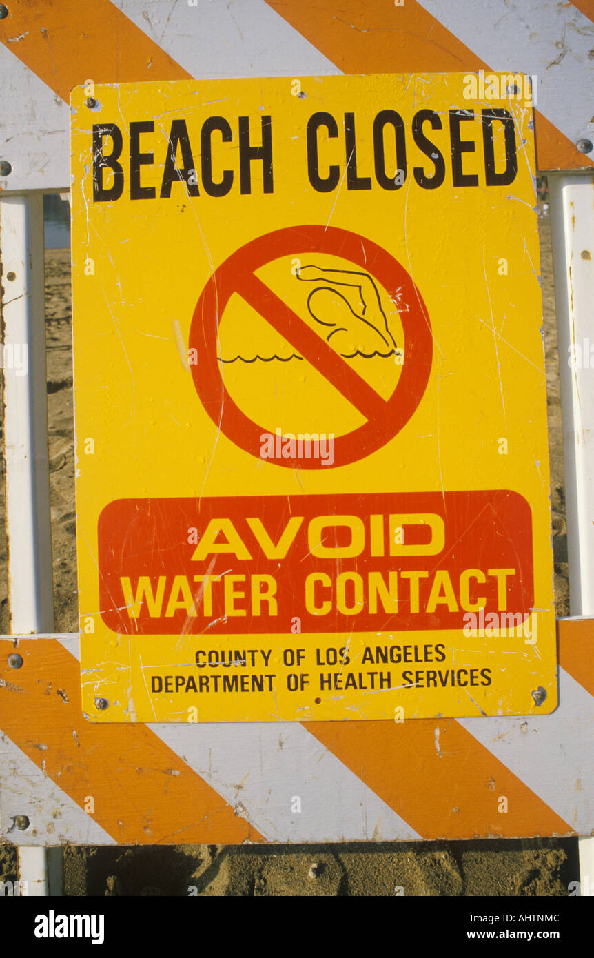 A beach closed warning sign Stock Photo - Alamy
