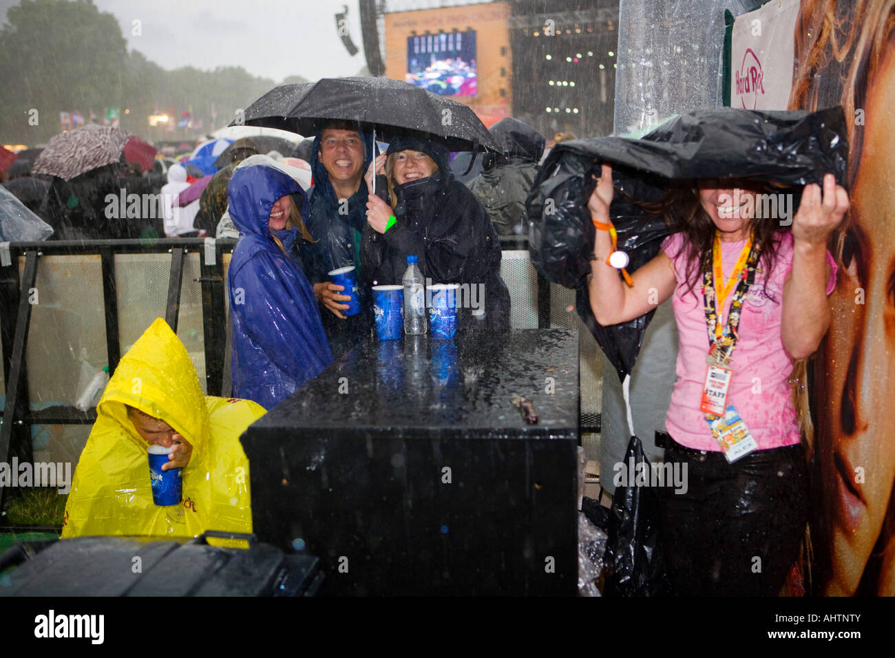 Heavy rain at Hyde Park Calling music festival 2007 Stock Photo - Alamy