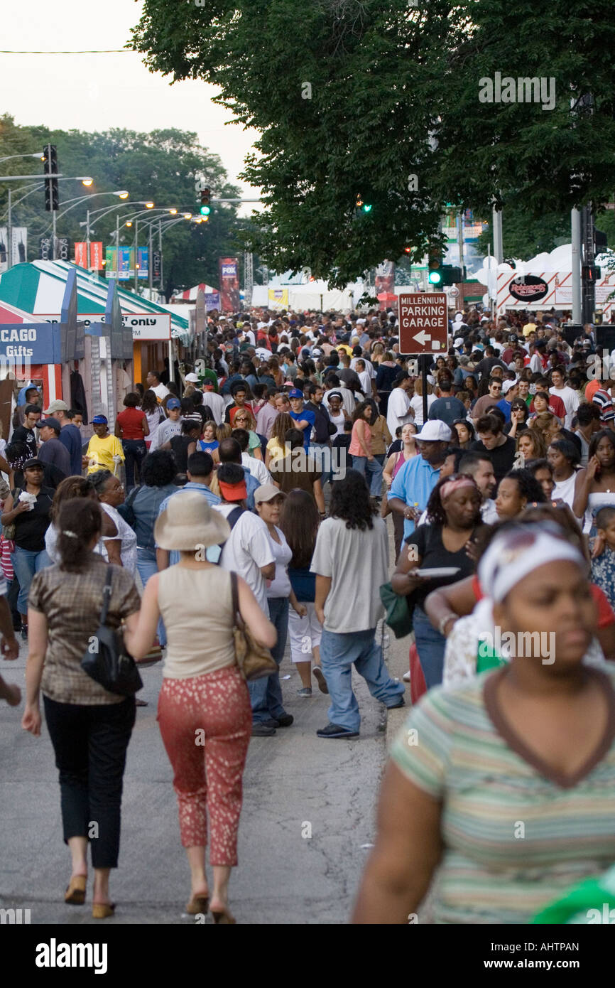 Large crowd of people walking at the Taste of Chicago outdoor festival ...