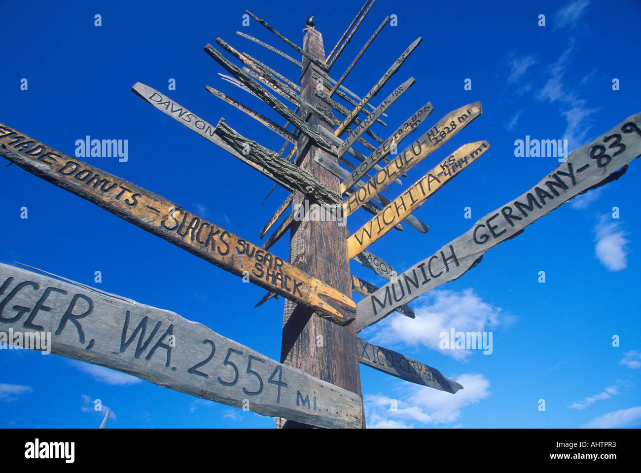 Miscellaneous distance signs in Alaska Route 1 Stock Photo - Alamy