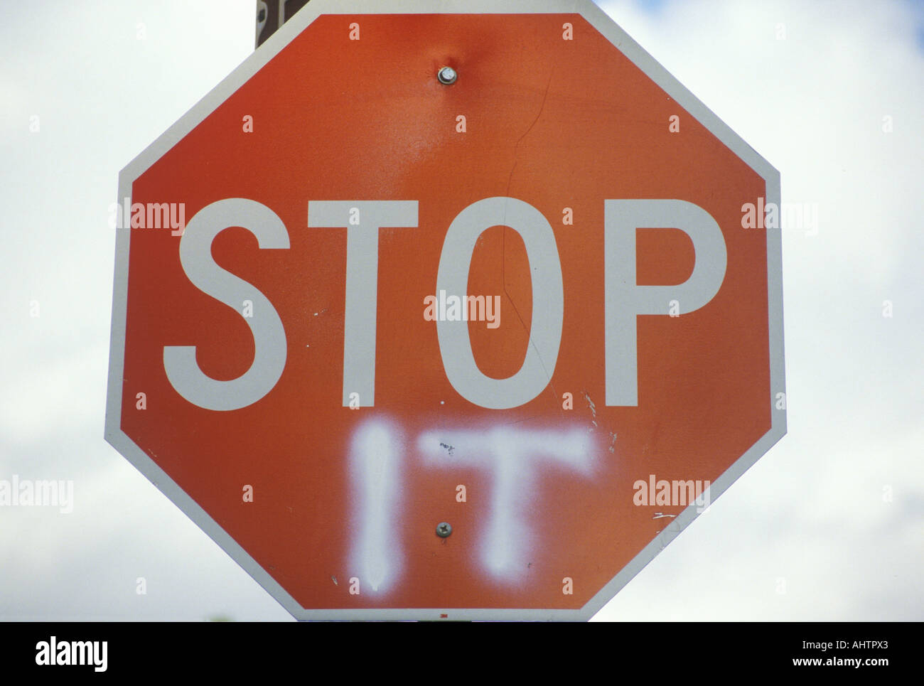 Stop sign vandalized hi-res stock photography and images - Alamy