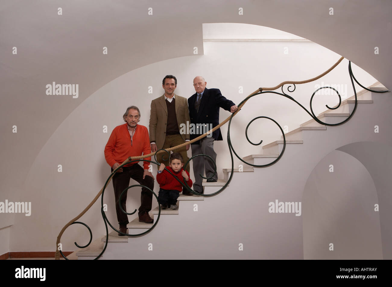 Multigenerational family on staircase, portrait Stock Photo - Alamy