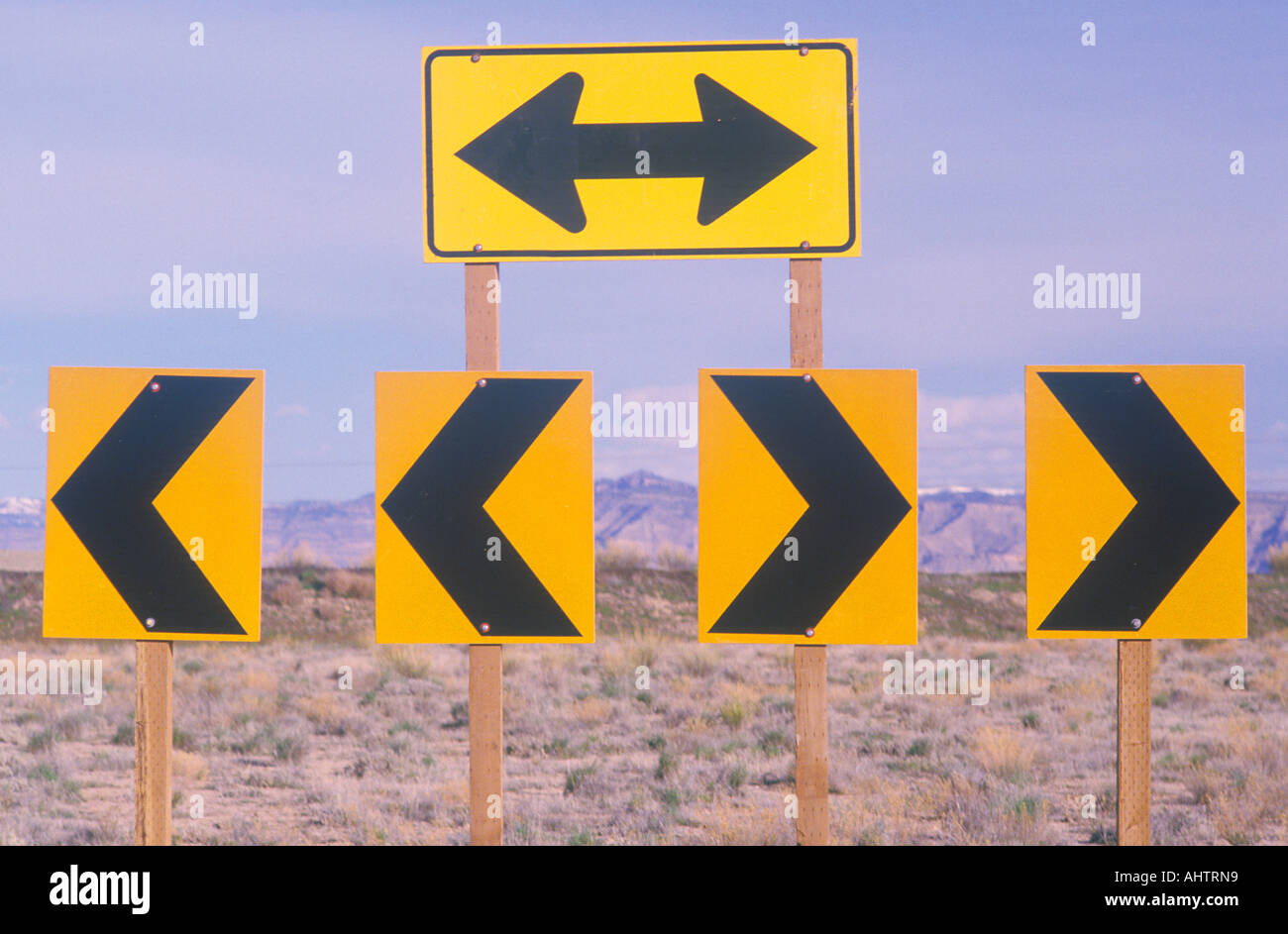 Miscellaneous arrows in the desert Stock Photo - Alamy