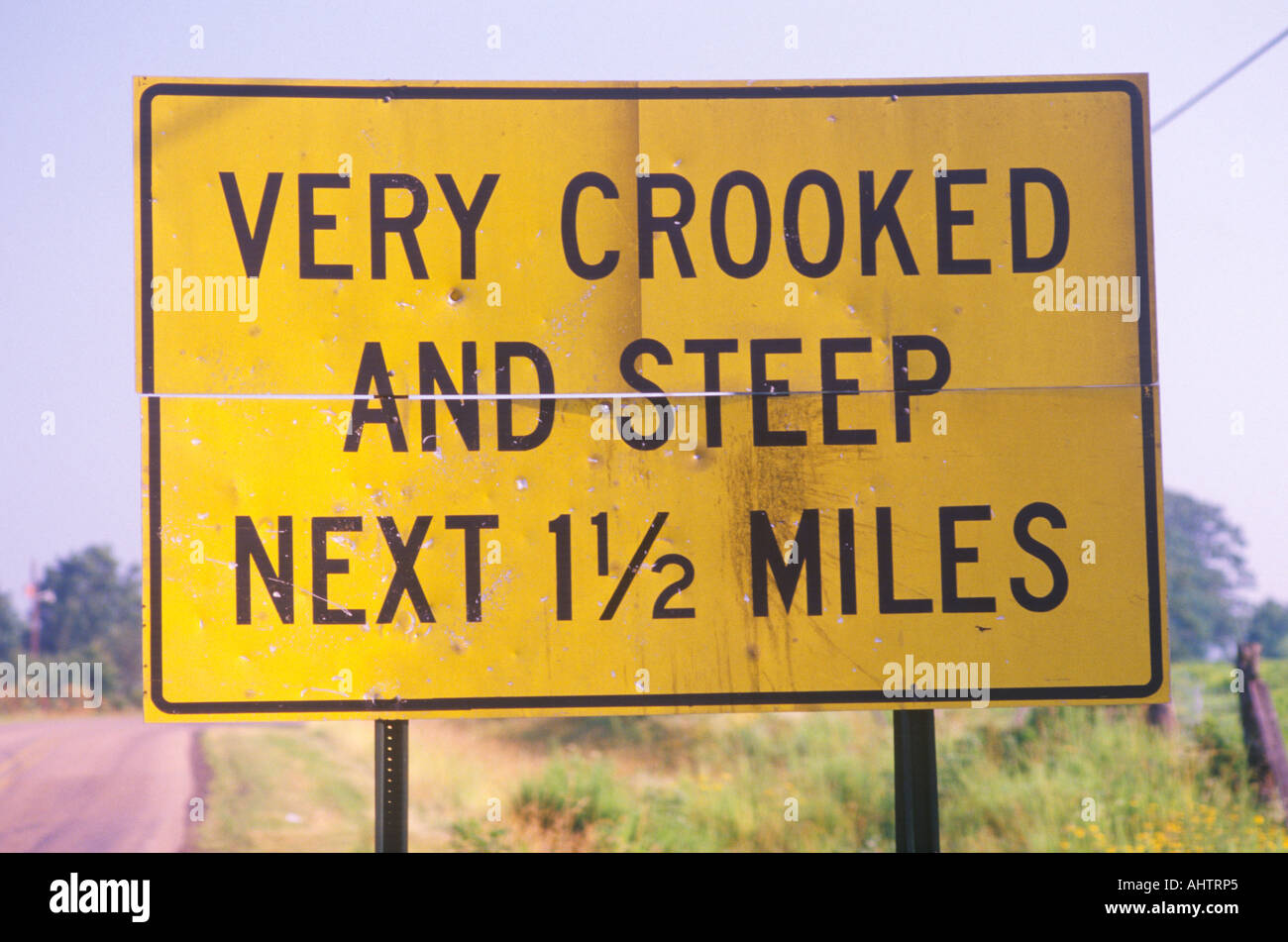 Crooked road signs hi-res stock photography and images - Alamy