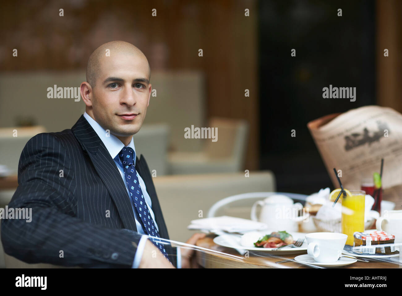 A businessman in a restaurant Stock Photo - Alamy