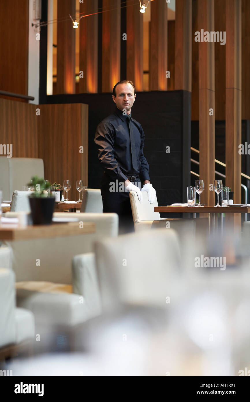 Waiter getting table ready hi-res stock photography and images - Alamy