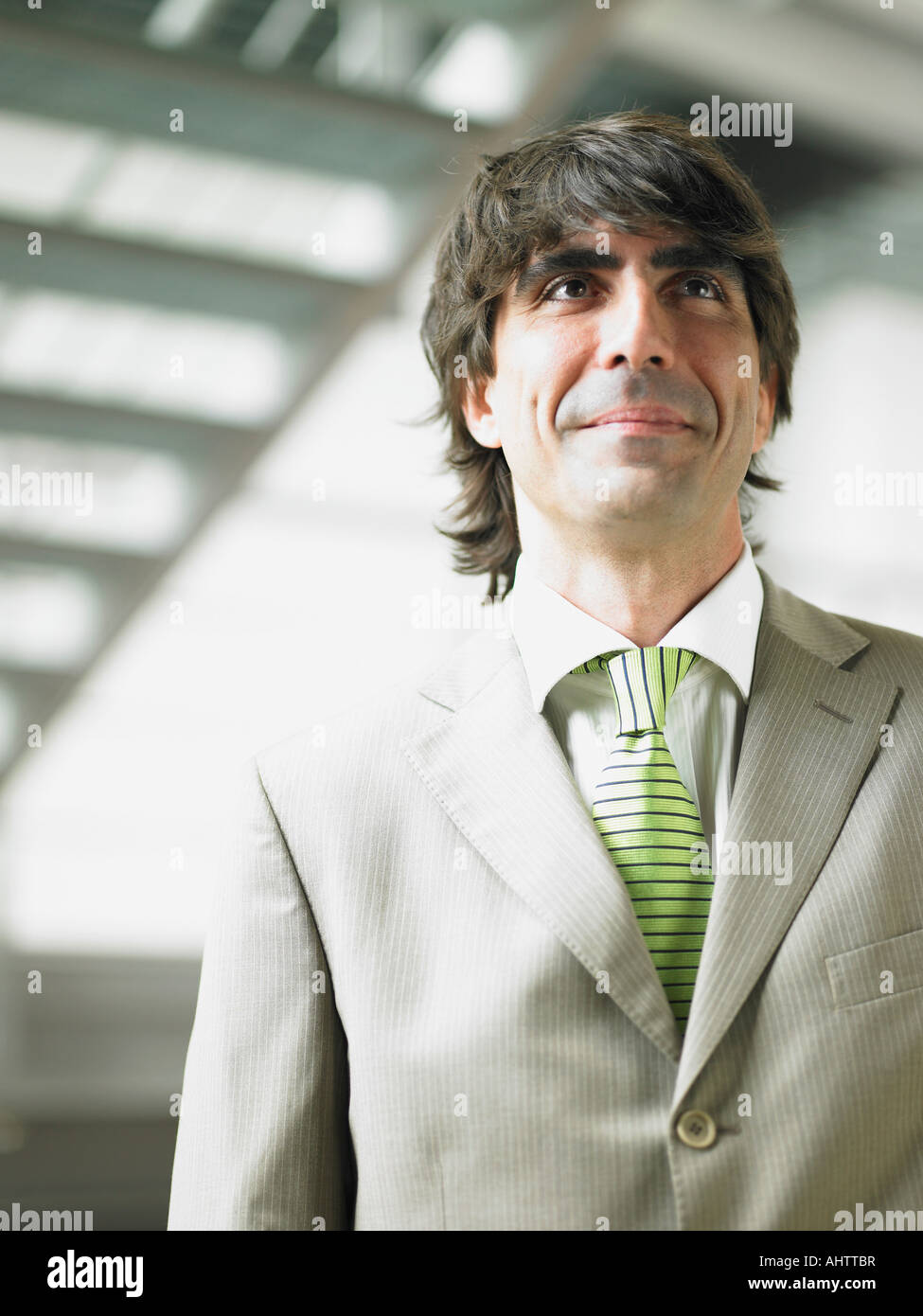 Businessman in an office Stock Photo - Alamy