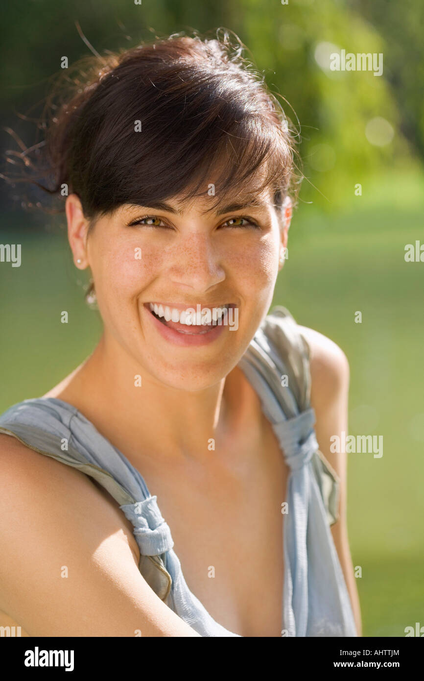 Woman smiling outdoors Stock Photo - Alamy