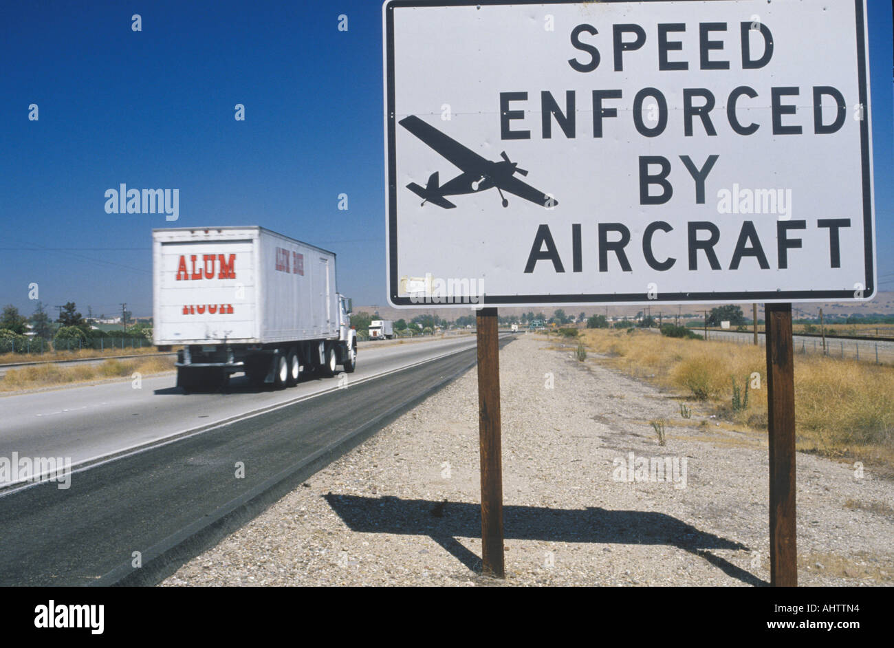 A sign that reads Speed enforced by aircraft Stock Photo - Alamy