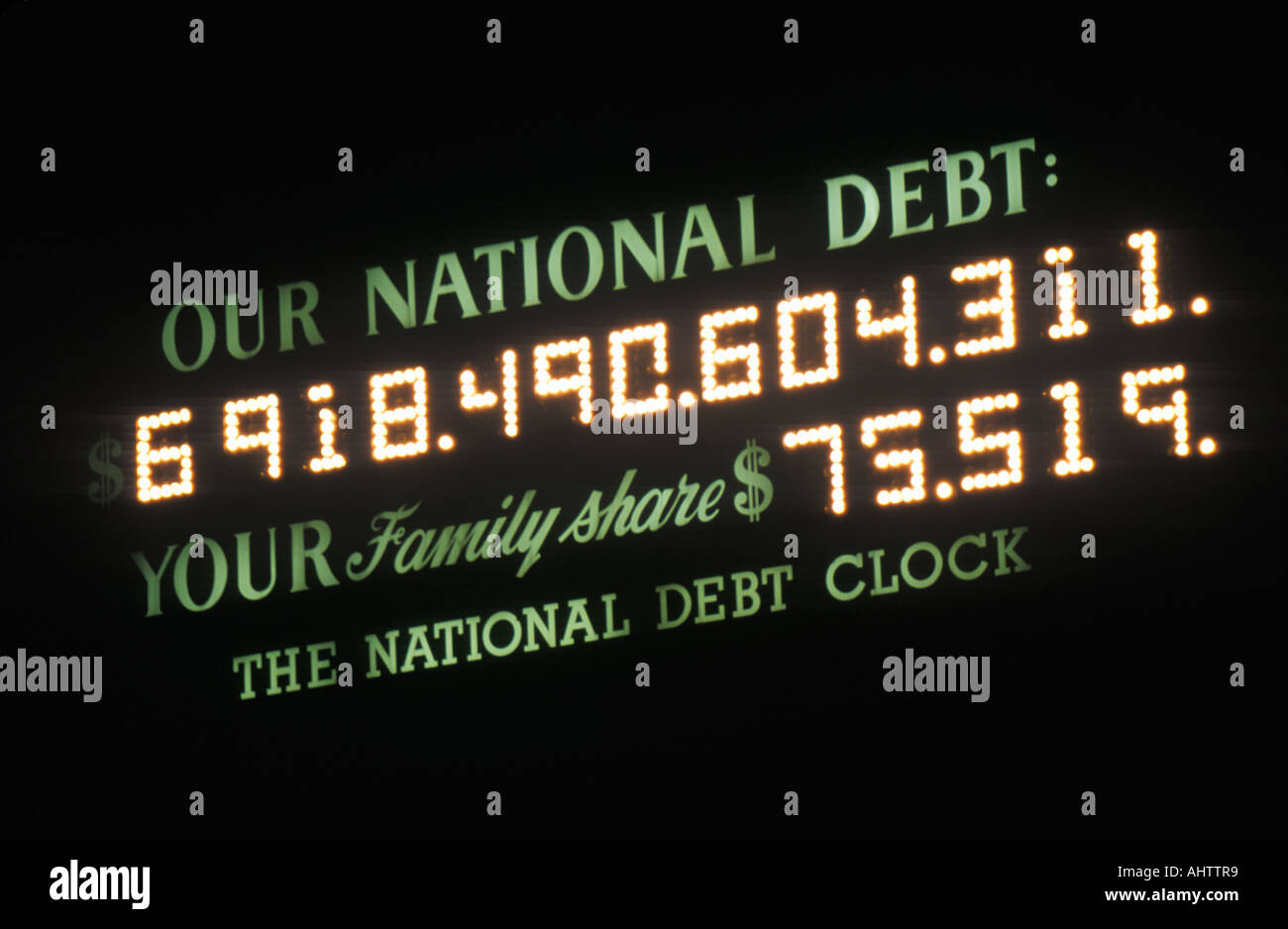 USA National Debt and National Debt Clock in New York City counts money ...