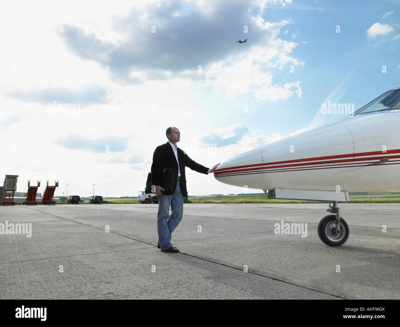 Businessman airplane tarmac hi-res stock photography and images - Alamy