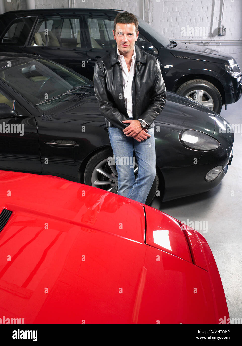 Aston martin in garage hi-res stock photography and images - Alamy