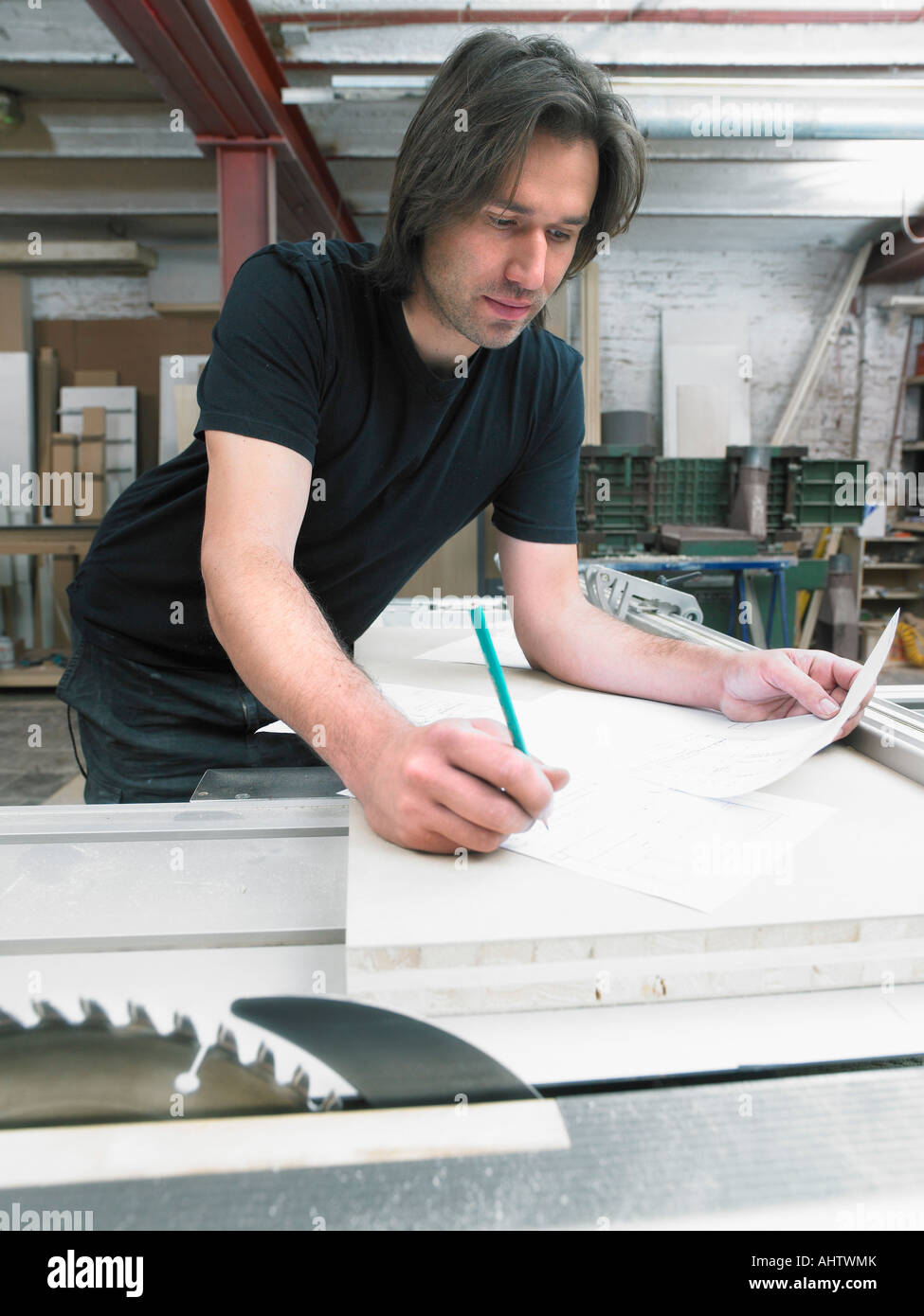 Carpenter working in his workshop Stock Photo - Alamy