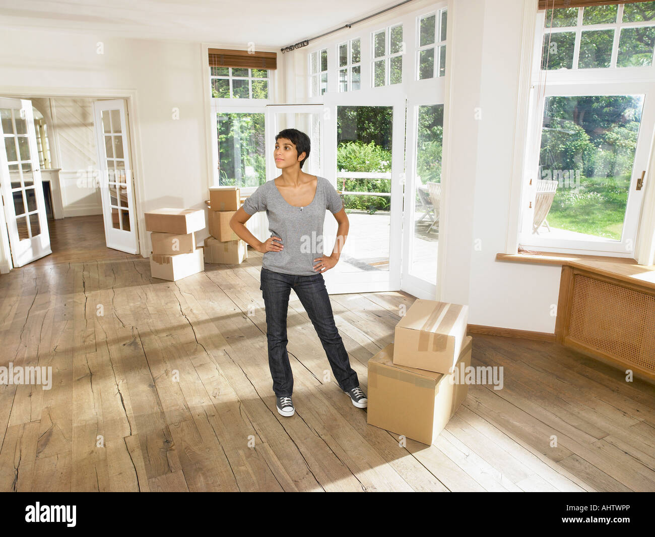 Women moving into new house Stock Photo - Alamy